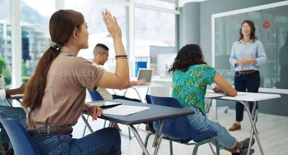 Shot of a room of university students interacting with their professor ...