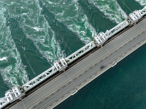 Water Passing Through a Storm Surge Barrier Stock Photo by CloudVisual