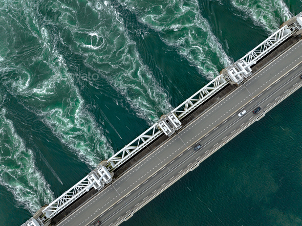Water Passing Through a Storm Surge Barrier Stock Photo by Stock87