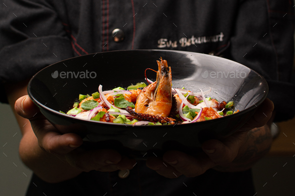 Seafood aspic. Salty beet jelly with shrimp, prawns and octopus. Side ...