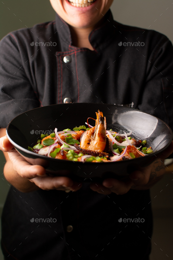 Seafood aspic. Salty beet jelly with shrimp, prawns and octopus. Side ...