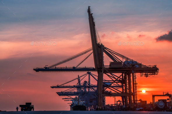 Cargo ship and truck at seaport waiting for container dock crane ...