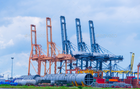 Cargo ship and truck at seaport waiting for container dock crane ...
