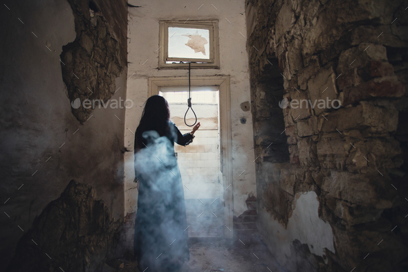 Scary ghost woman in haunted house with rope with a noose Stock Photo by erika8213