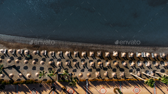 Aerial drone top view to the sand tropical beach with nobody. Row of ...