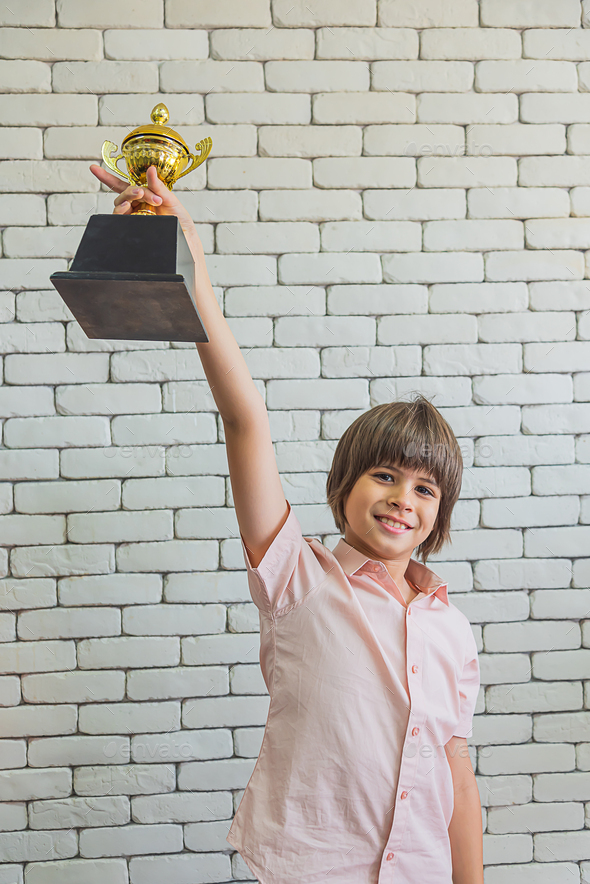 International elementary school boy receiving the Outstanding Student ...