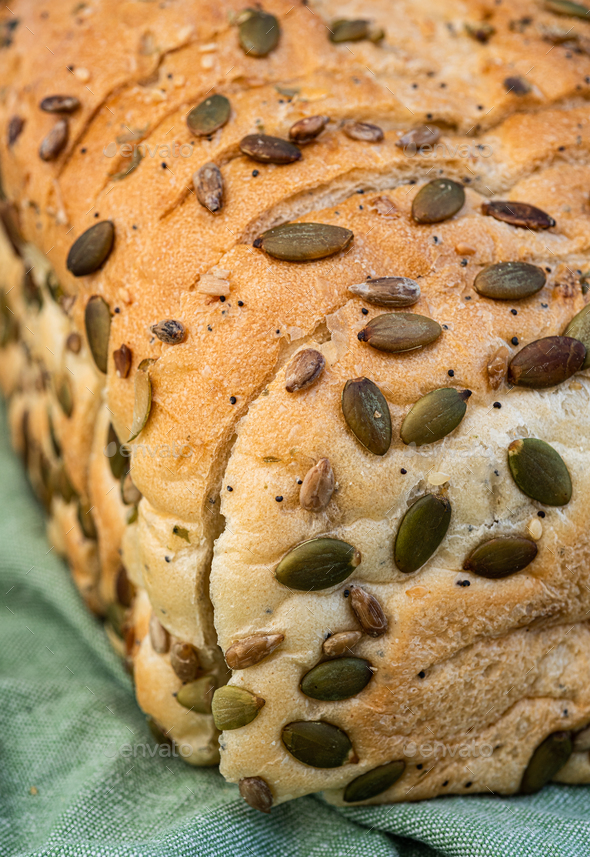 pumpkin seed encrusted baked bread Stock Photo by MarieKazalia | PhotoDune