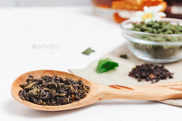 Fresh harvest of tea leaves on white background, top view. Assortment ...
