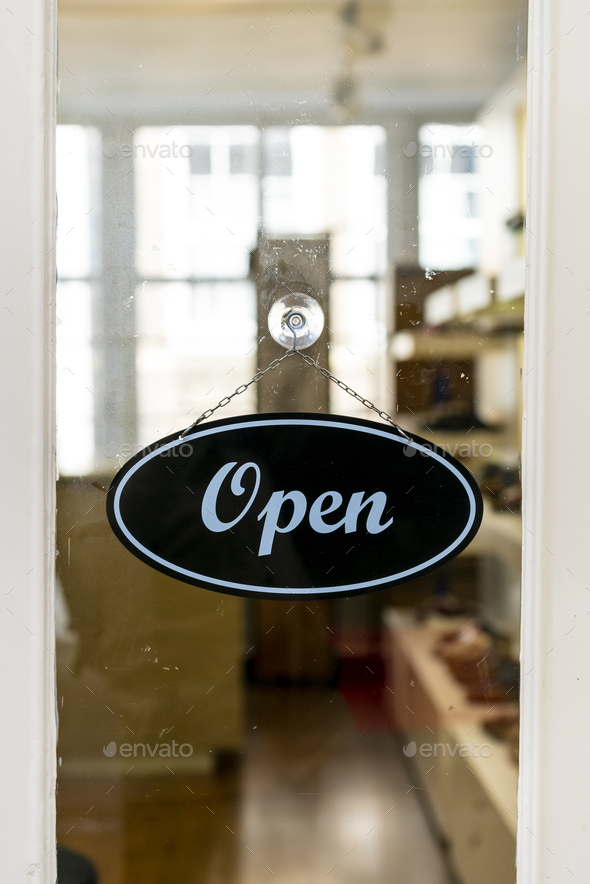 Open shop door oval sign hanging Stock Photo by TTStock-Photography