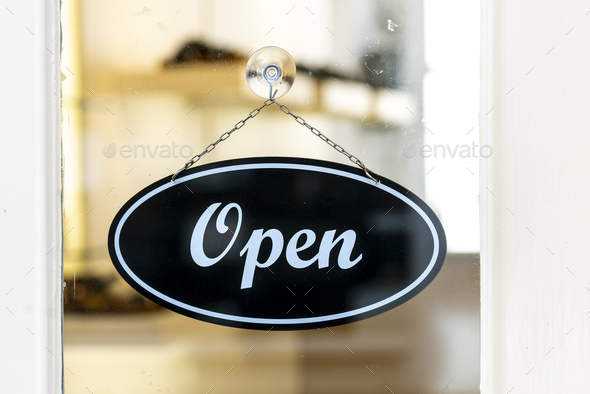 Open shop door oval sign hanging Stock Photo by TTStock-Photography