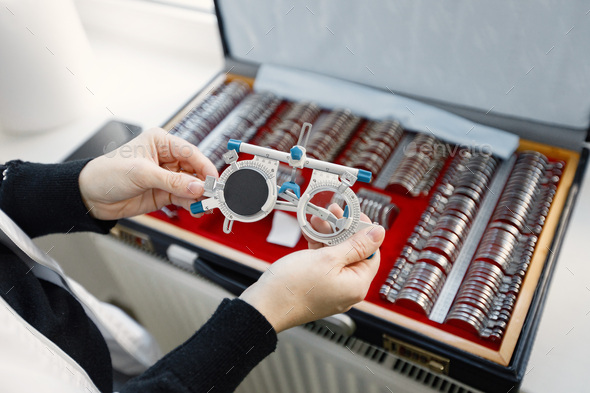 Photo of a set of ophthalmic trial lenses for vision testing and trial ...