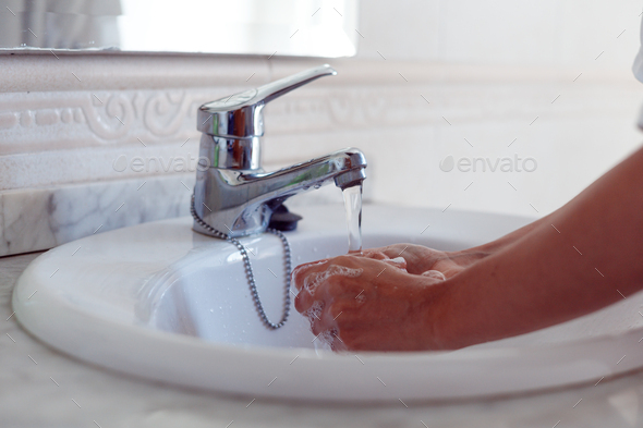 cute woman hands washing in bathroom, real people, hygiene concept ...