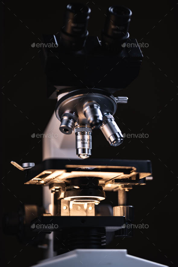 Scientific microscope lens working with data analysis in the medical ...