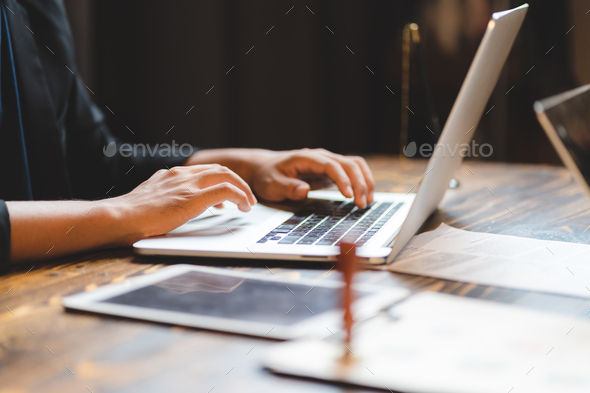 professional business person typing on computer laptop desk at office ...