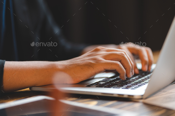 professional business person typing on computer laptop desk at office ...