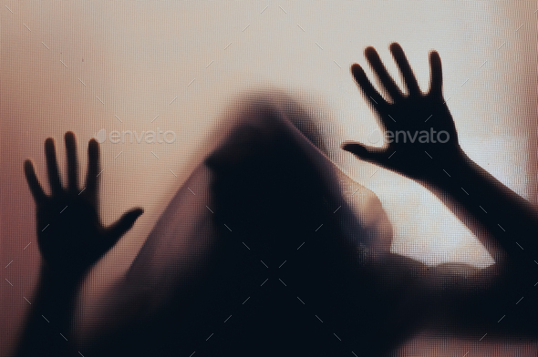 Shadowy figure behind glass - horror background Stock Photo by erika8213
