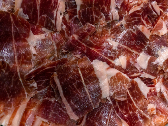 Slices spanish dried pork also known as Jamon Serrano. Typical tapa ...