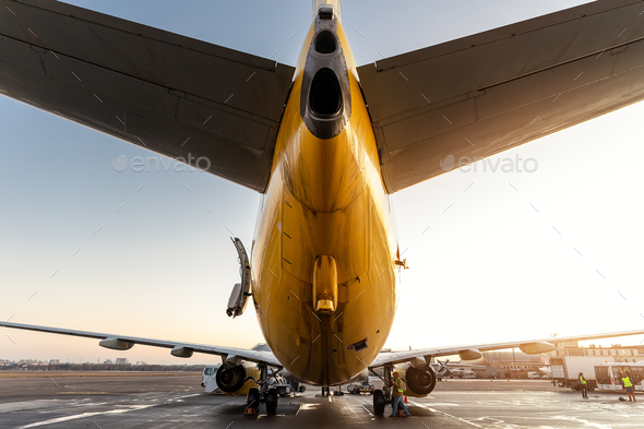 Scenic low angle pov rear bottom view of big modern passenger aircraft ...