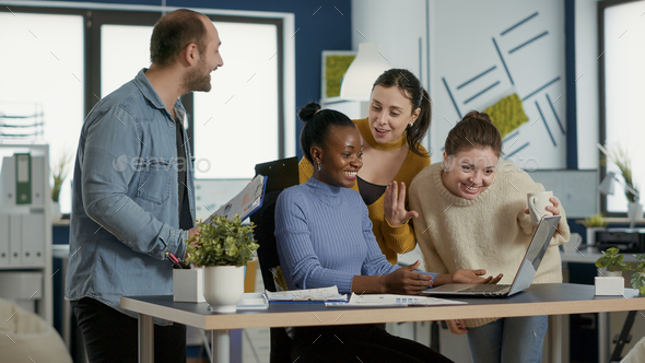 Smiling successful employee with great work results receiving ...