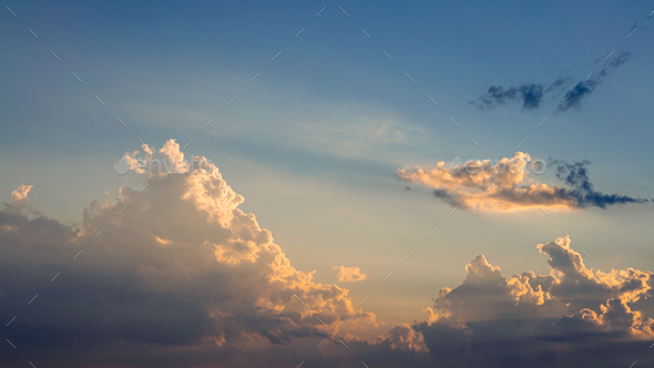 Wonderful view of cumulus clouds sky with orange sun light at sunset of ...