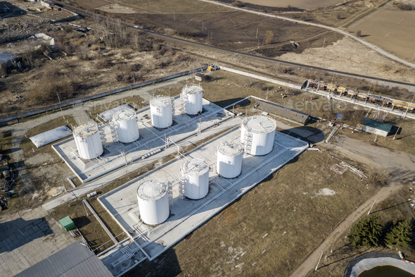 Top view of fuel oil refinery industrial factory. White cylindrical ...