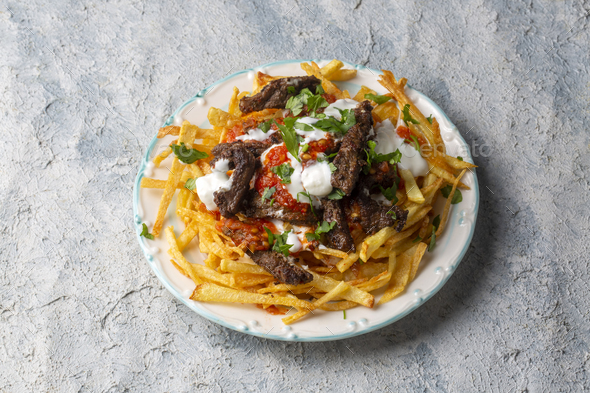 Turkish food; Cokertme Kebab - Beef meat kebab with yoghurt and french ...