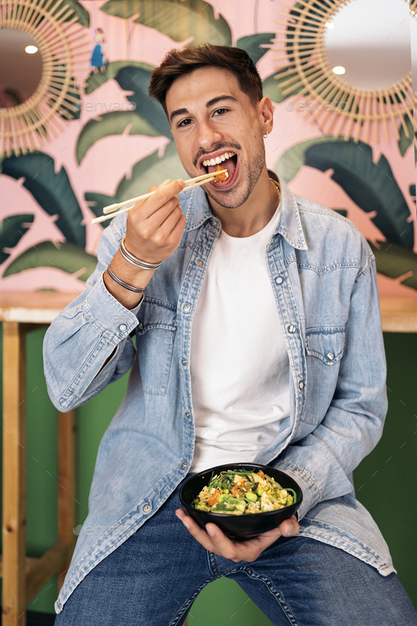 Cool Man Eating Poke Stock Photo by nunezimage | PhotoDune
