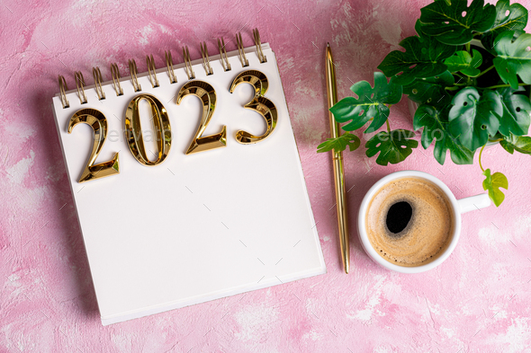 New year resolutions 2023 on desk. 2023 resolutions list with notebook ...