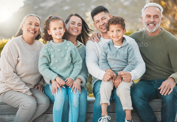 Shot of a multi-generational family posing together outdoors Stock ...