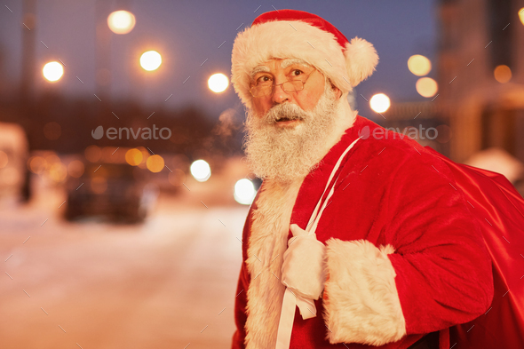 Santa Claus Delivering Presents On Christmas Eve Stock Photo by ...