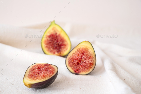 Figs on beige color table cloth. Stock Photo by bukatju | PhotoDune