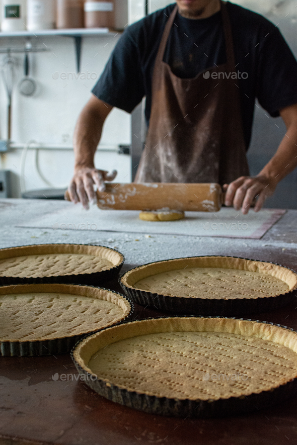 Baking and kneading cake. Filling the macadamias cake with toffee and ...