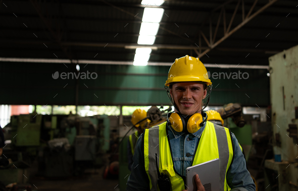 Chief mechanical engineer working in a mechanical factory Stock Photo ...