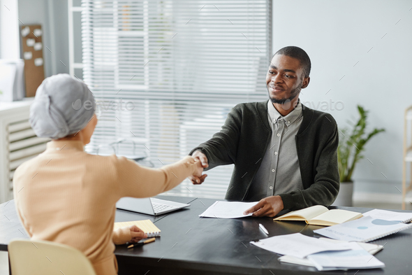 Candidate Shaking Hands With Recruiter in Job interview Stock Photo by ...