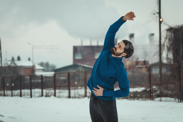 Stretching In Cold Stock Photo by micens | PhotoDune