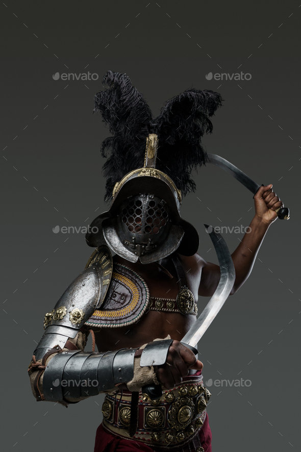 Strong gladiator from ancient rome with dual swords Stock Photo by fxquadro