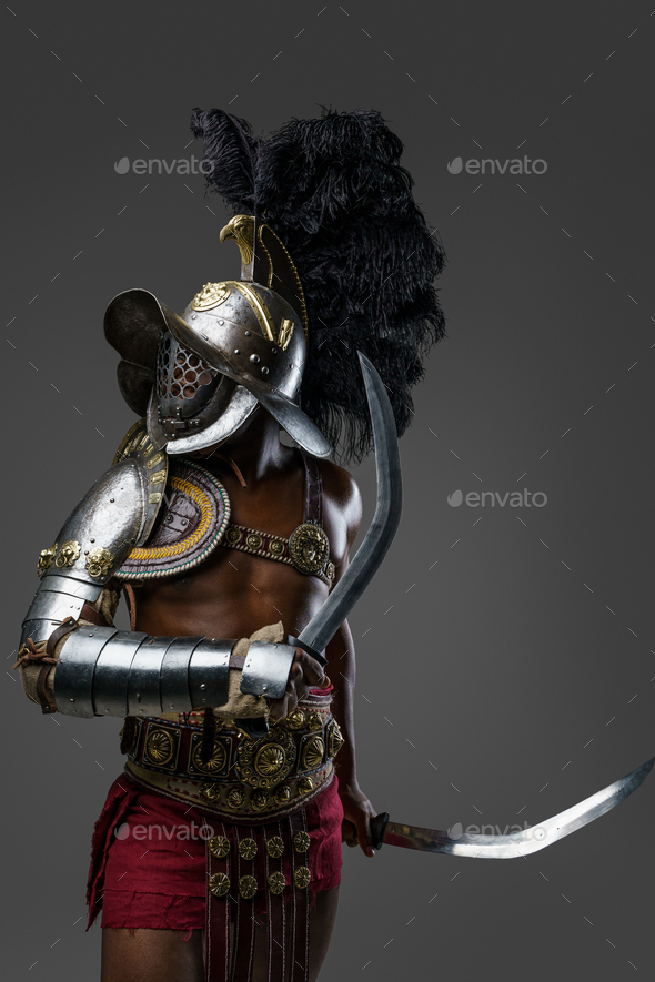 Strong gladiator from ancient rome with dual swords Stock Photo by fxquadro