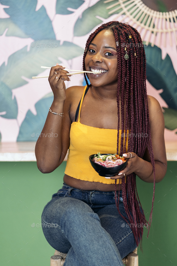 Happy African Woman Eating Poke Stock Photo by nunezimage | PhotoDune