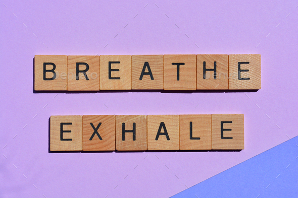 Breathe, Exhale, words as banner headline Stock Photo by JosieElias
