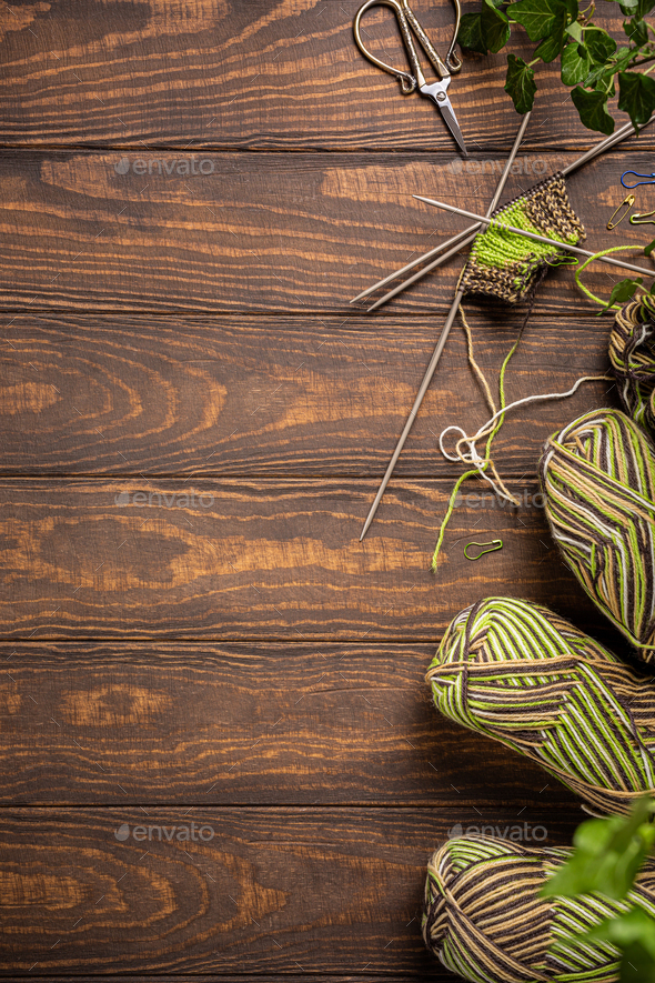 Female hobby knitting. Knitting project in progress Stock Photo by Merinka
