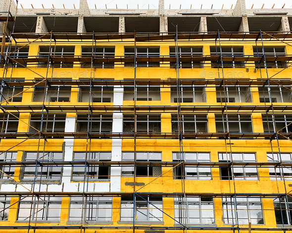 Scaffolding for yellow construction Stock Photo by Leonteena | PhotoDune