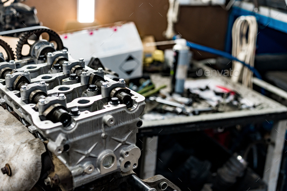 Disassembled car engine block at car service station Stock Photo by ...