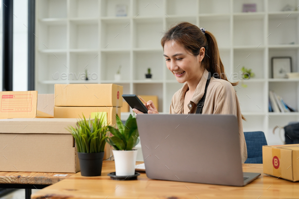 Young smiling beautiful owner asian woman freelance sme business online ...