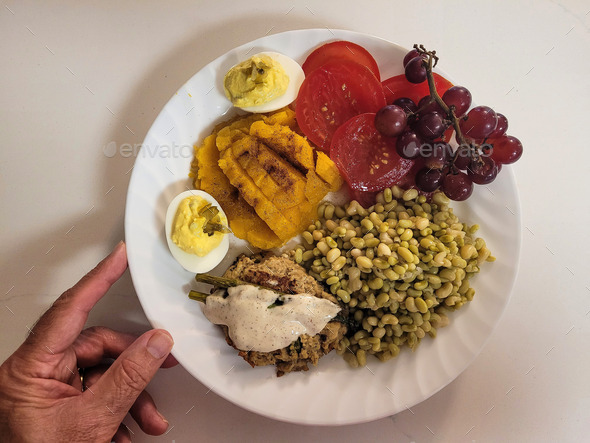 Overhead food flat lay home-cooked meal on white countertop. Stock ...
