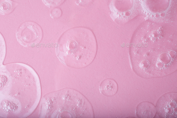 Macro photography of bubbly smear on raspberry pink background. Stock ...