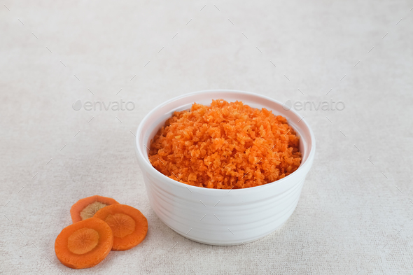 Organic carrots pulp juice, squeezed from a slow juicer Stock Photo by ...
