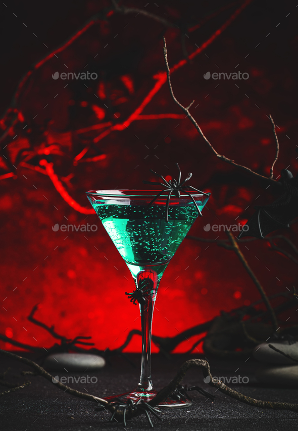 Halloween witch potion alcoholic cocktail on scary dark red background ...