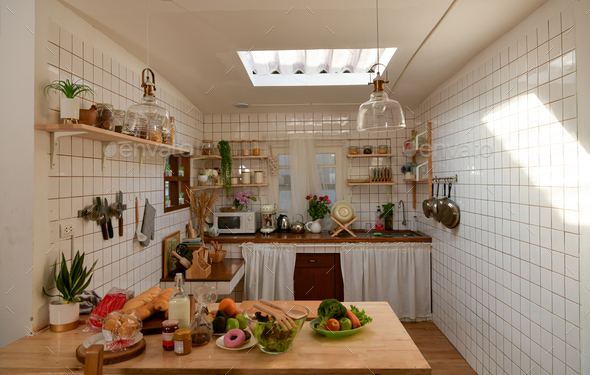 The kitchen is fully equipped with cooking utensils. Transparent and ...