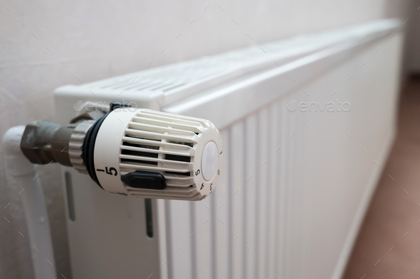 Radiator with thermostat and the ability to turn the knob and reduce ...