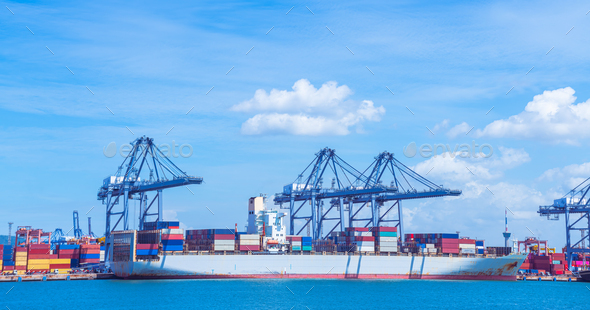 Cargo ship and truck at seaport waiting for container dock crane ...